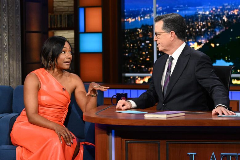 Wardrobe Breakdown: Tiffany Haddish One-Shoulder Orange Midi Dress On ...